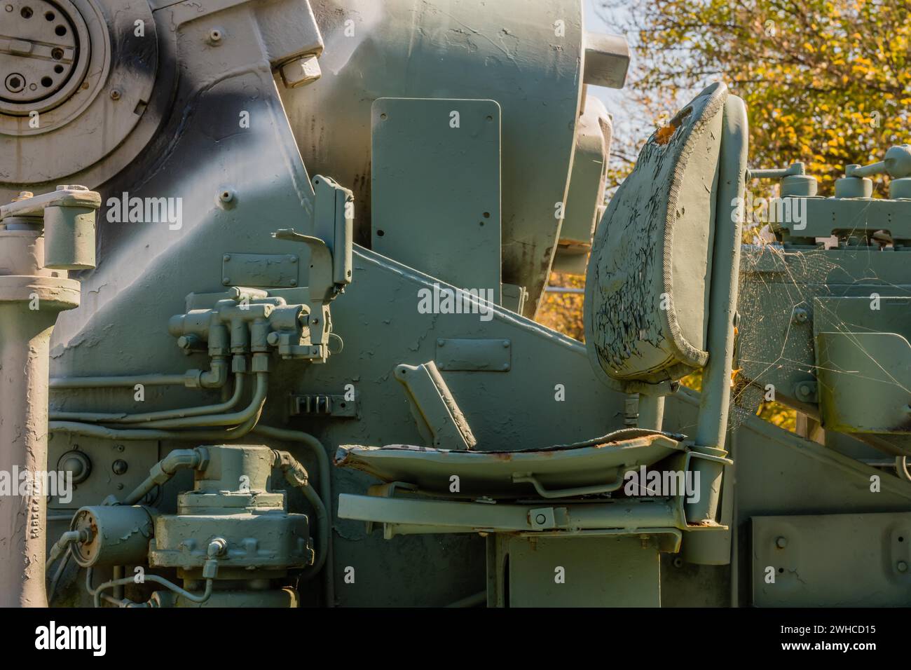 Side view of external seat on military artillery vehicle on display in ...