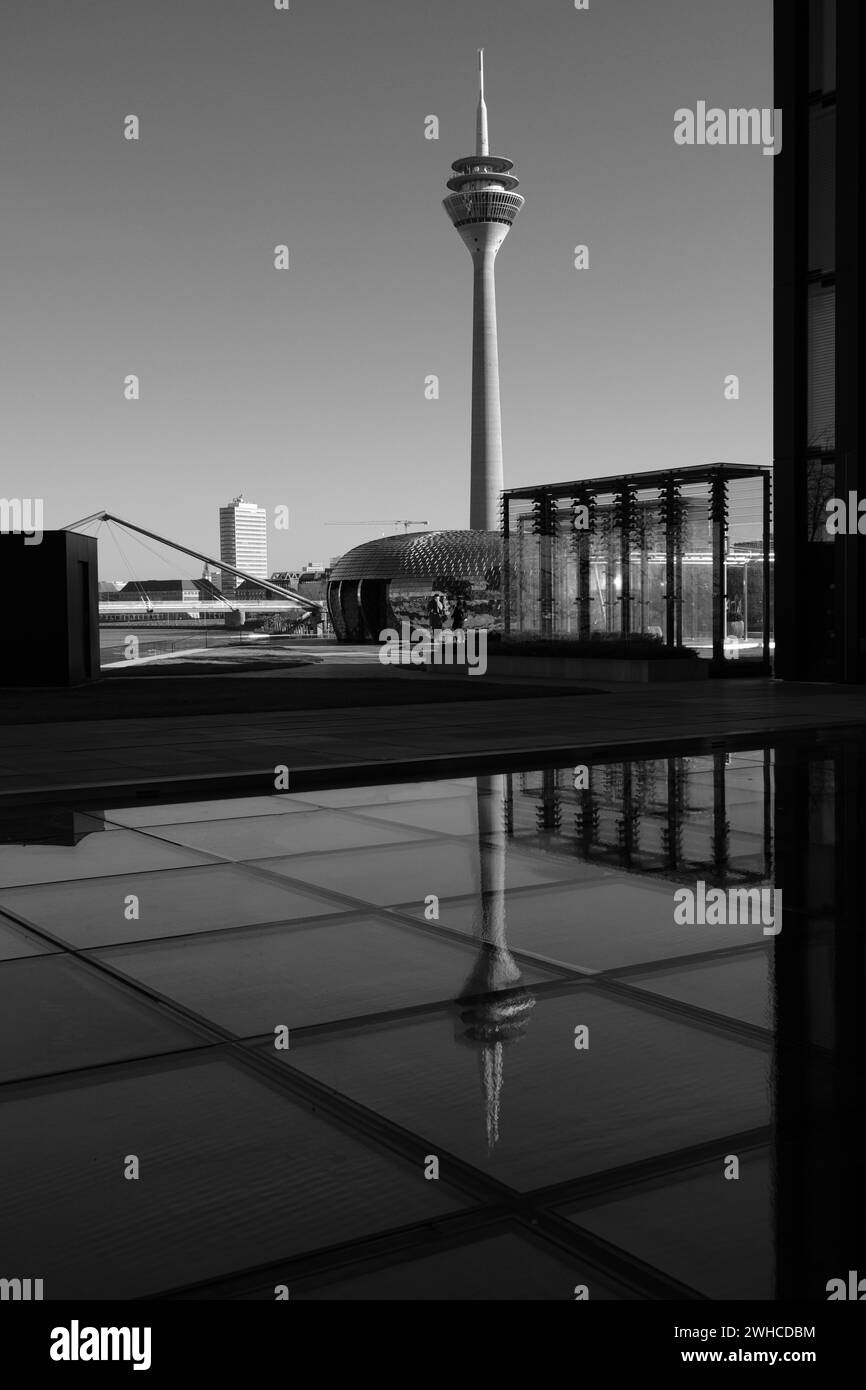 View of the Rhine Tower in the Media Harbour, reflection, black and ...