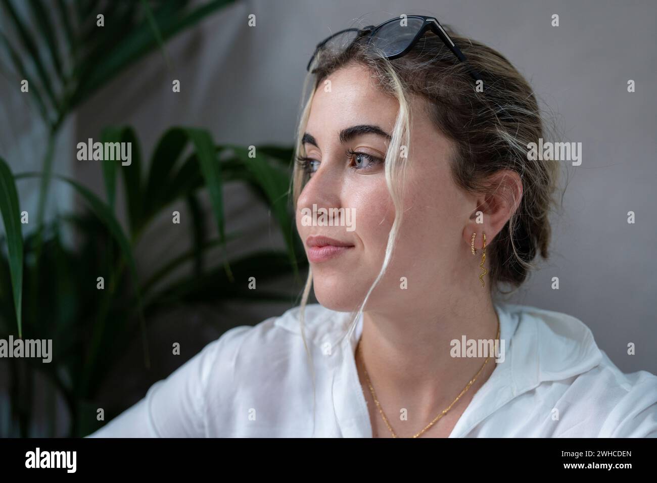Serious young caucasian business woman head shot portrait. Thoughtful ...