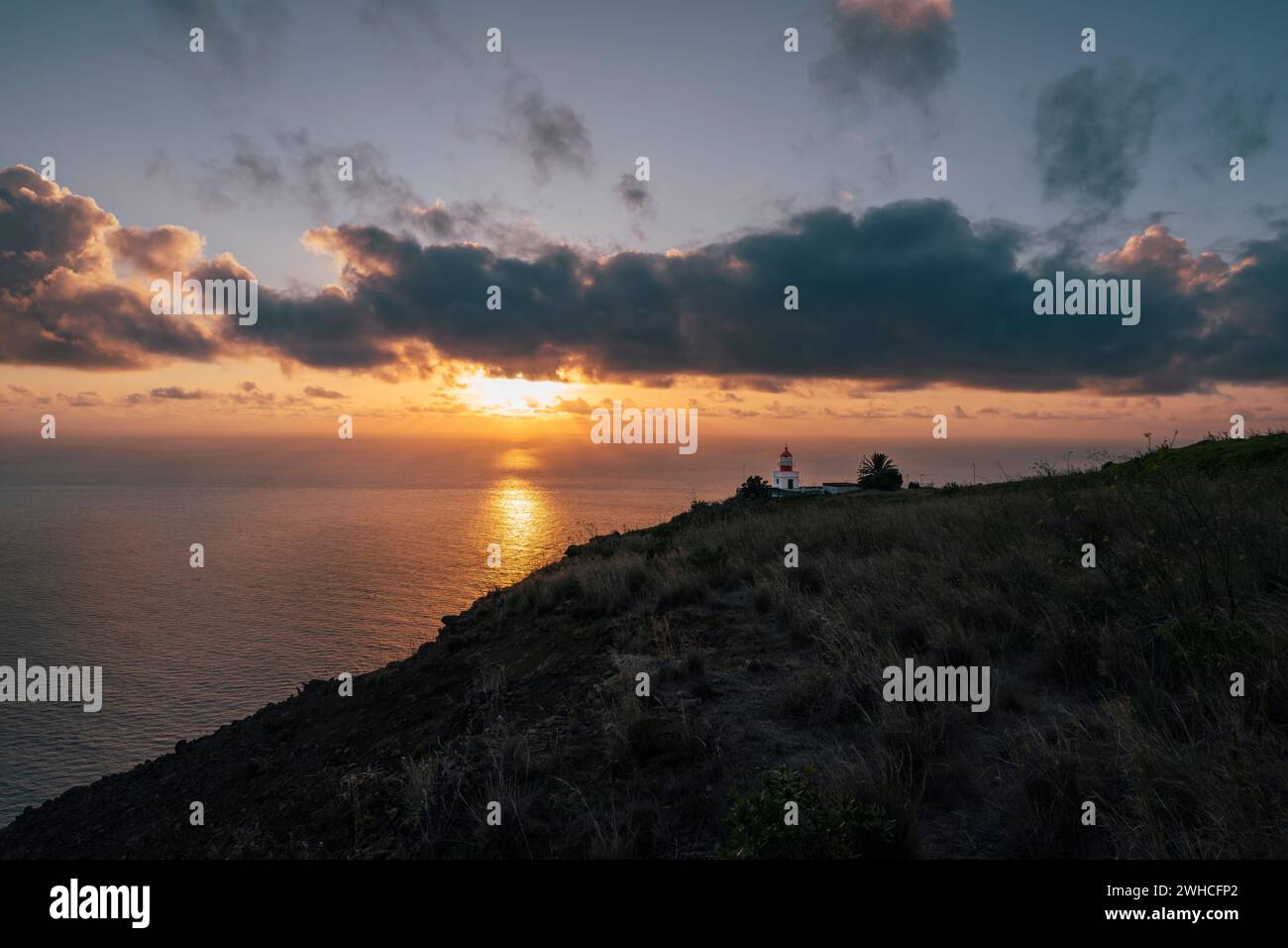 Sunset, lighthouse, Ponto da Pargo, west coast, Autonomous Region of ...