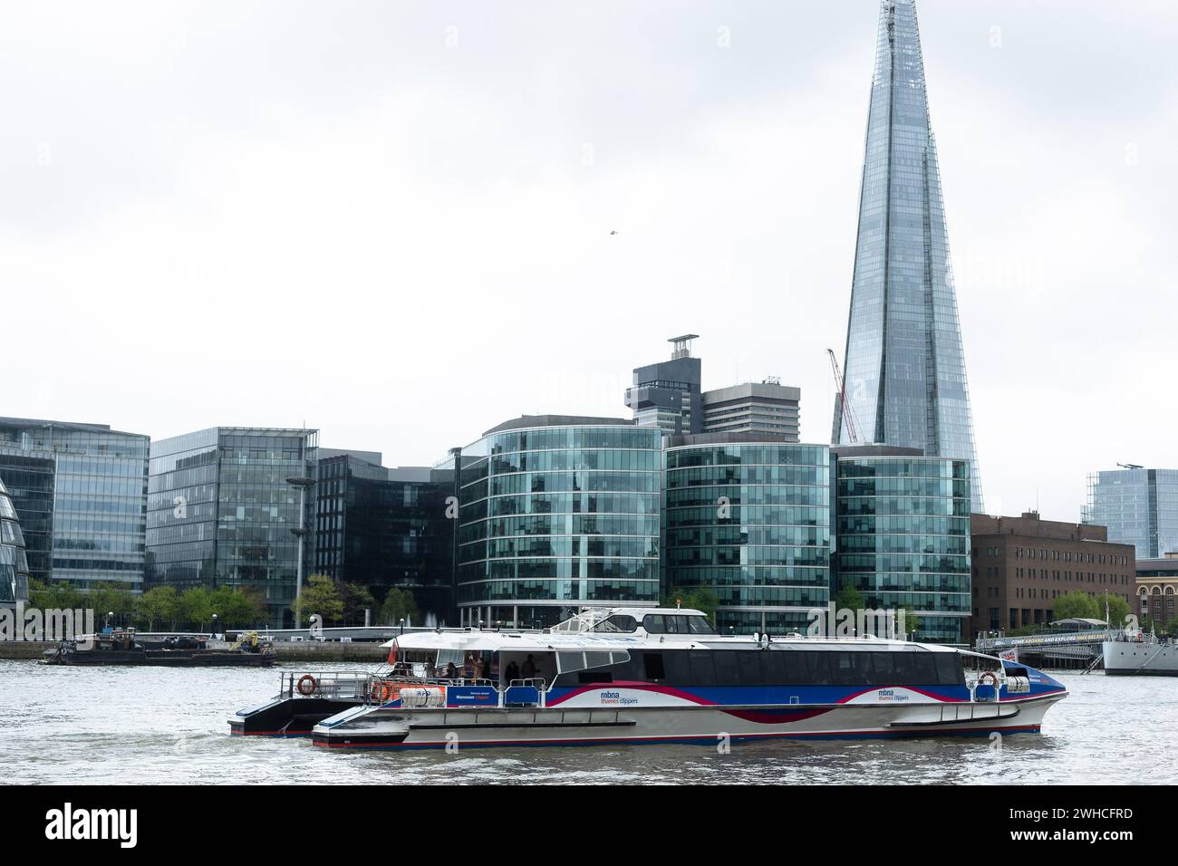 A Thames Clipper passes the Shard and development on the south bank of ...