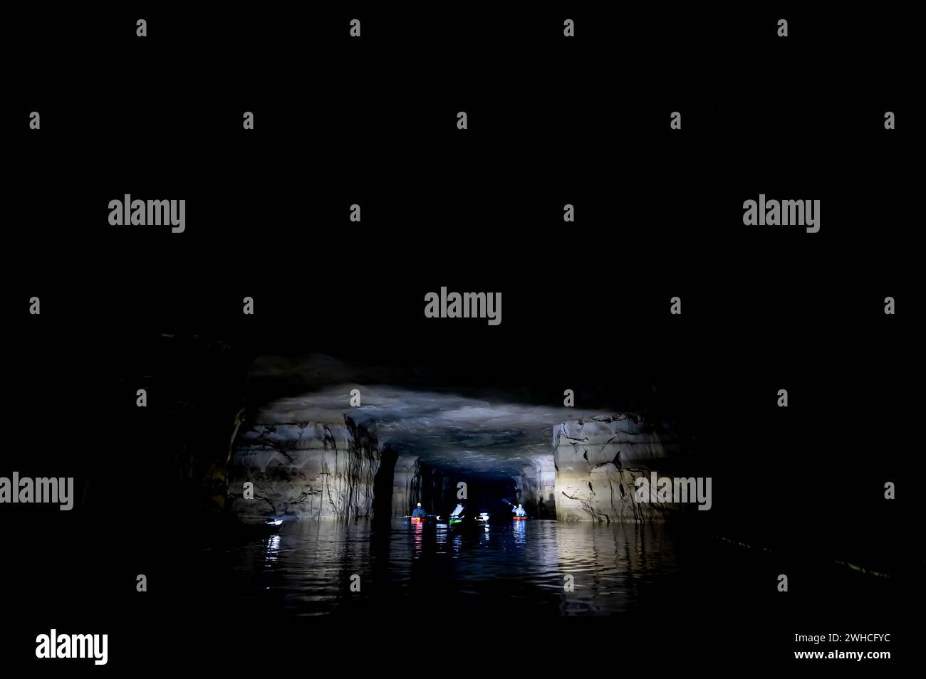 Kayaking a abandoned silica mine that is flooded with water Stock Photo ...