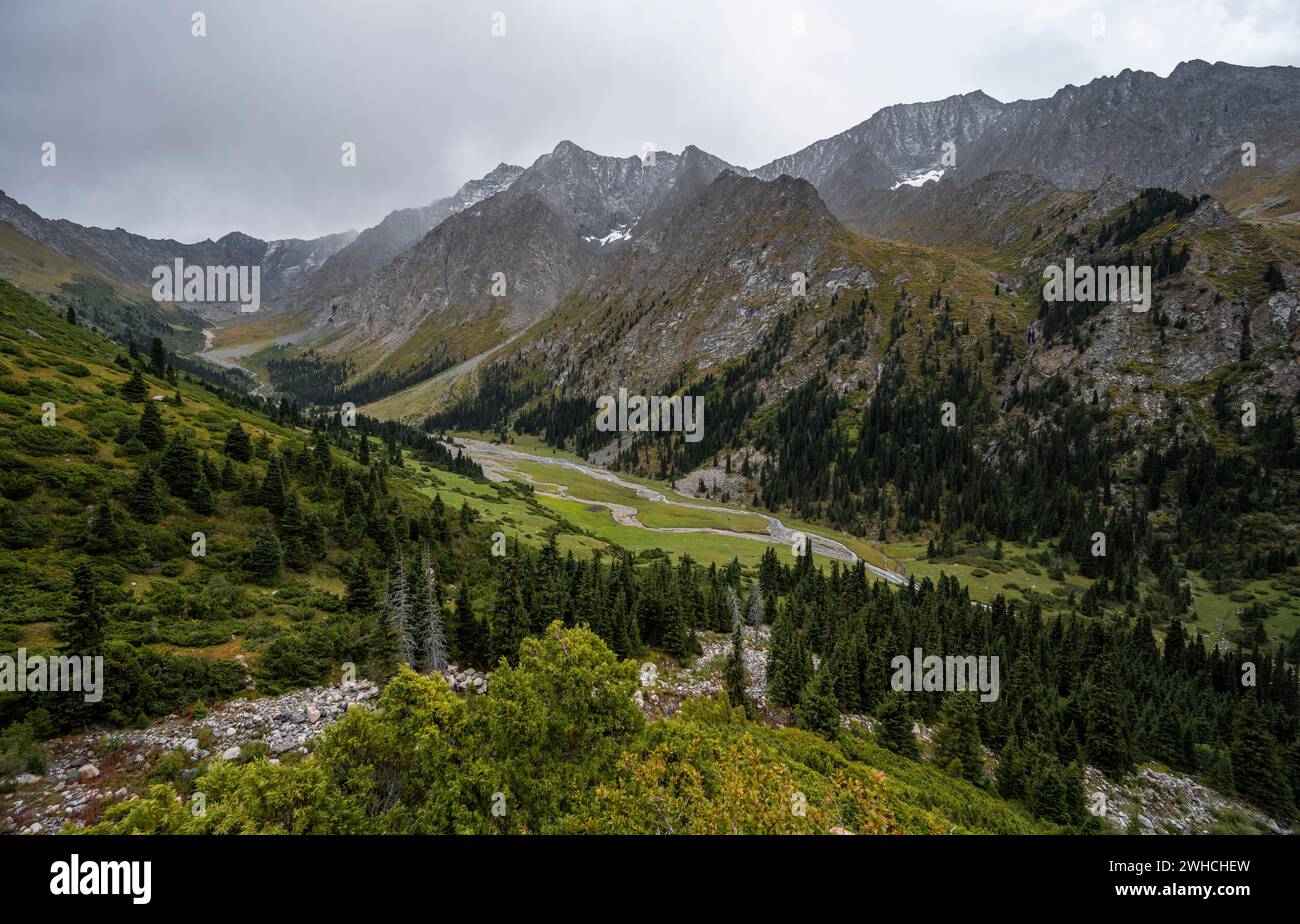 Green mountain valley with river and steep mountain peaks, Chong Kyzyl ...