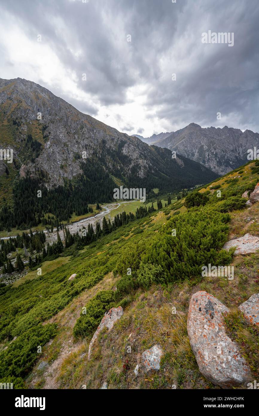 Green mountain valley with river and steep mountain peaks, Chong Kyzyl ...