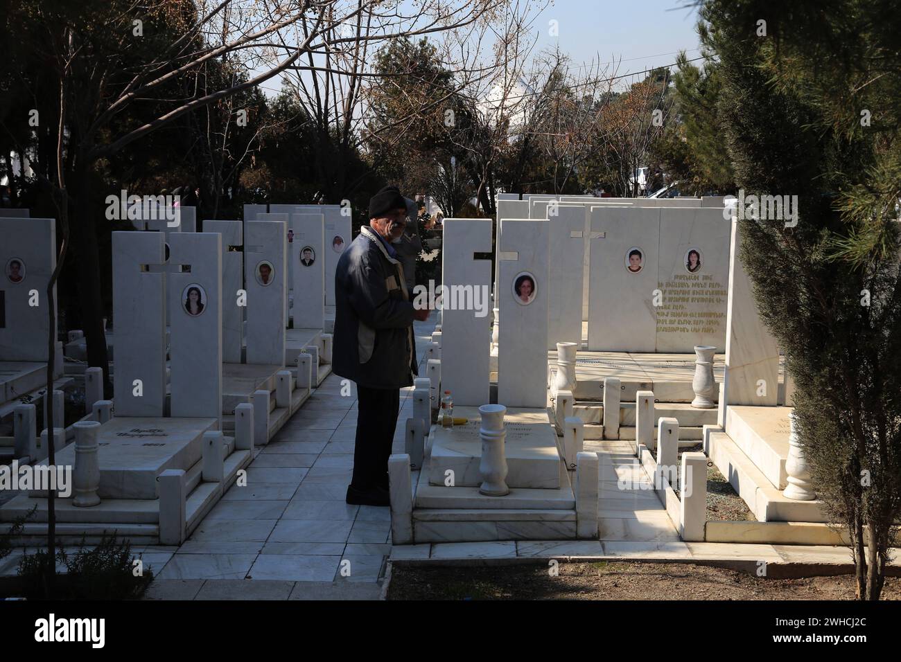 Tehran, Iran. 8th Feb, 2024. An Iranian Christian man stands at Nor ...