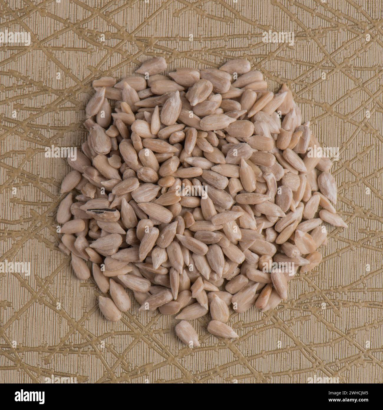 Circle of shelled sunflower seeds Stock Photo - Alamy
