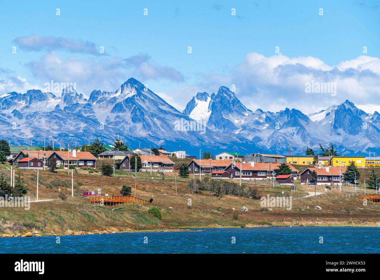 Architecture in the city of Ushuaia, behind the mountains of the island ...