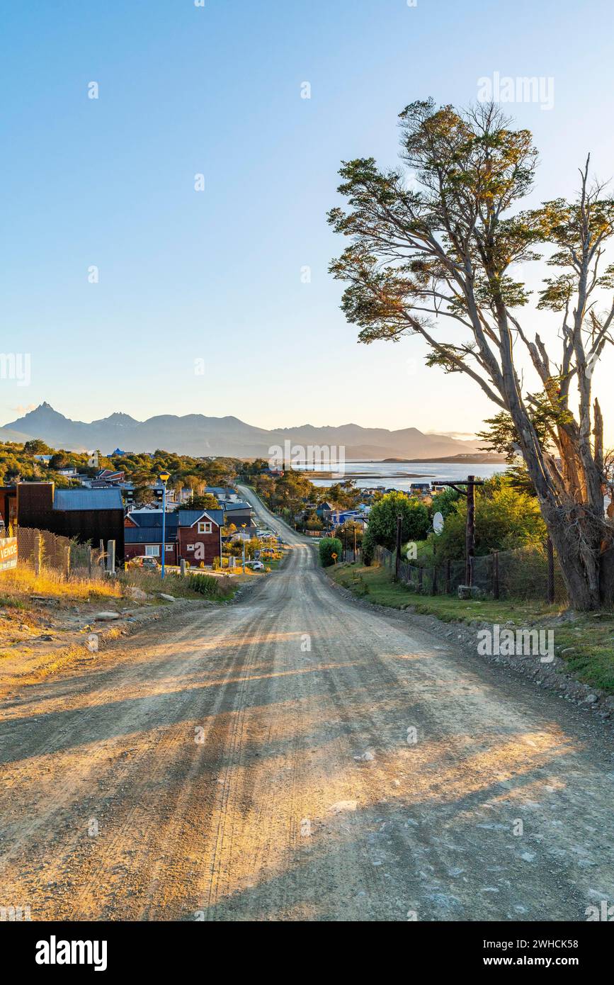 Earth road into the city of Ushuaia, behind the Beagle Channel, Tierra ...