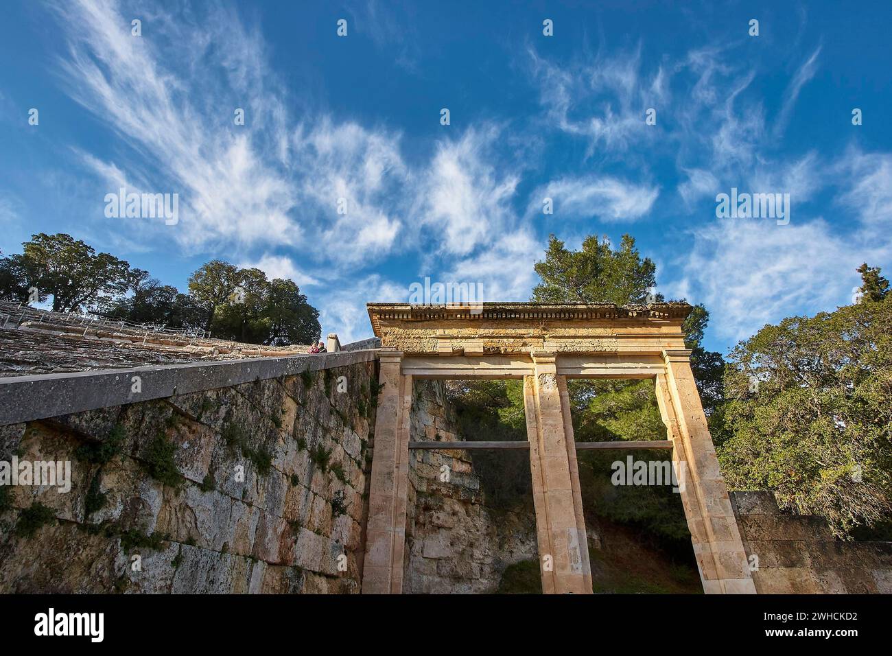 Ancient triumphal gate at the entrance of an amphitheatre in front of a ...