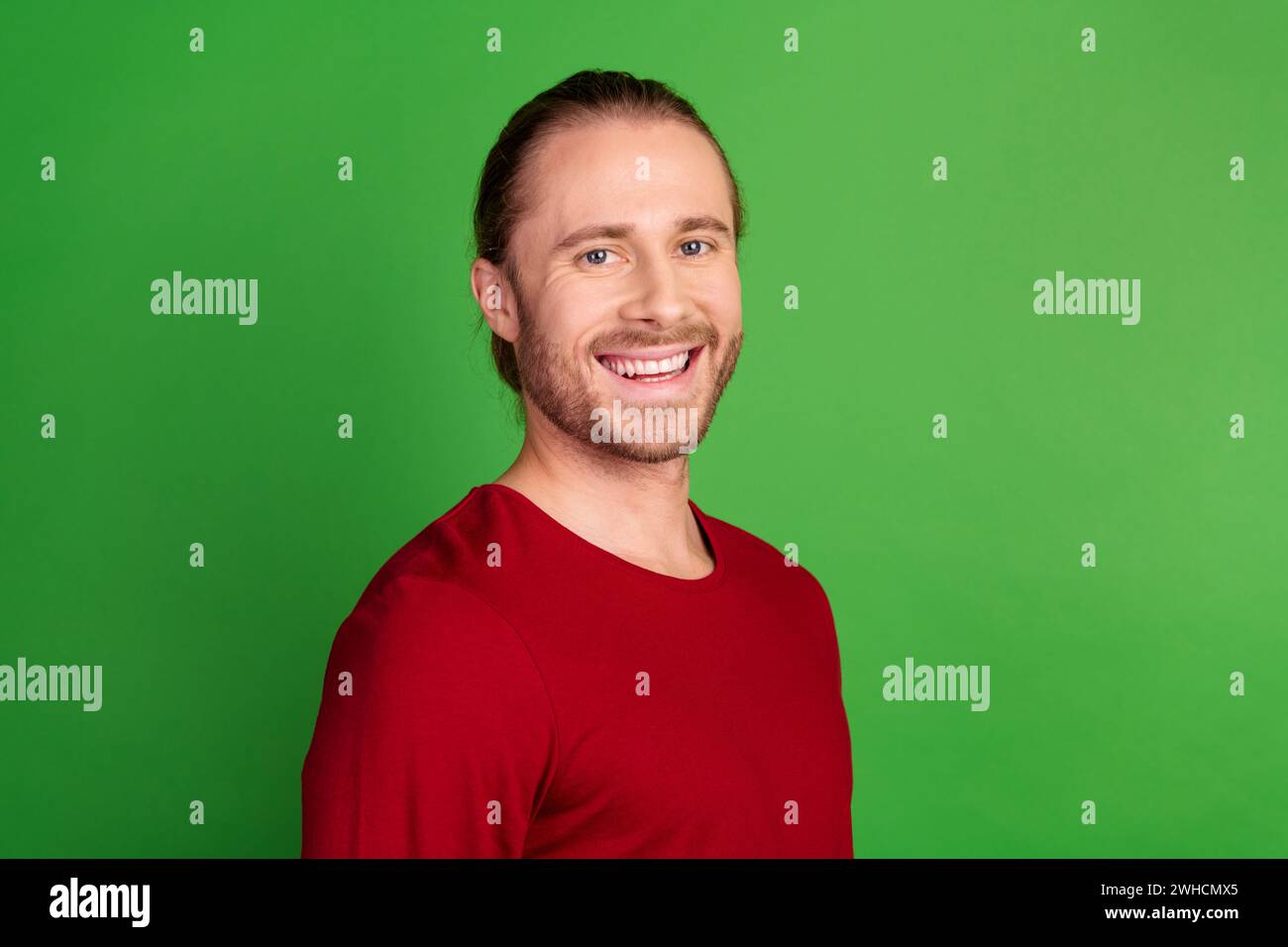 Portrait of nice positive candid sincere guy with long hairstyle wear ...