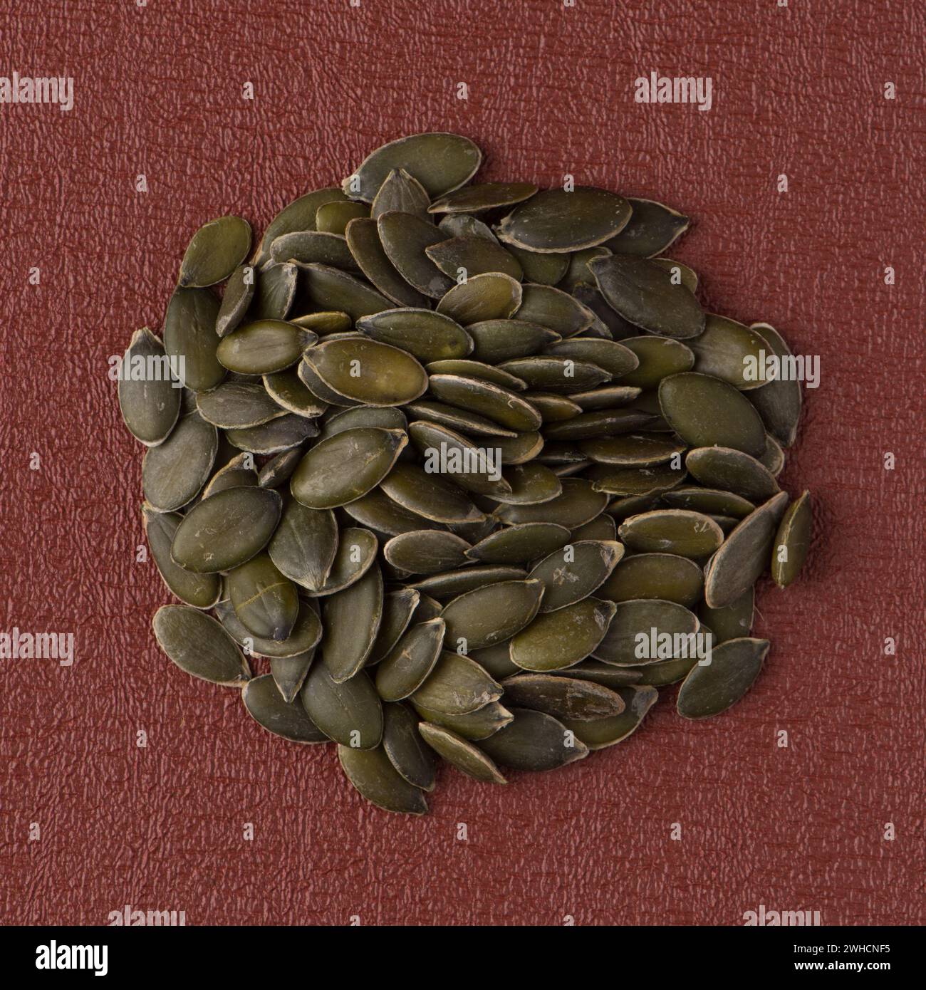 Circle of pumpkin seeds Stock Photo - Alamy