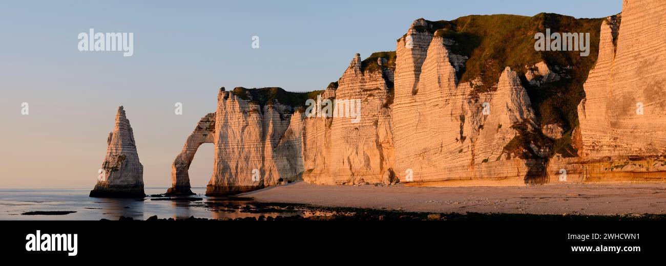 Steep cliffs with the Falaise d'Aval rock gate and the Aiguille ...