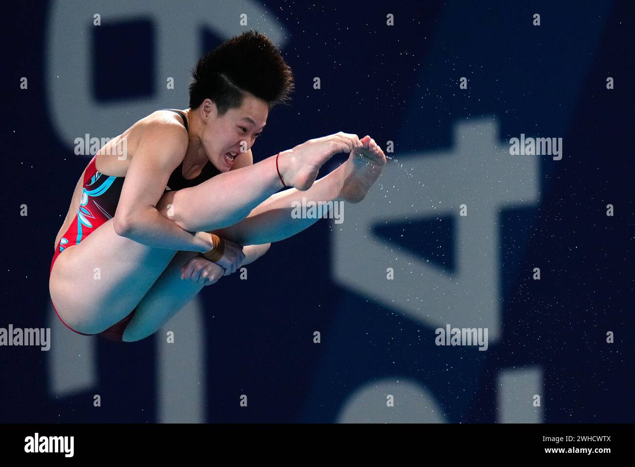 Chen Yiwen of China competes during the women's 3m springboard diving ...