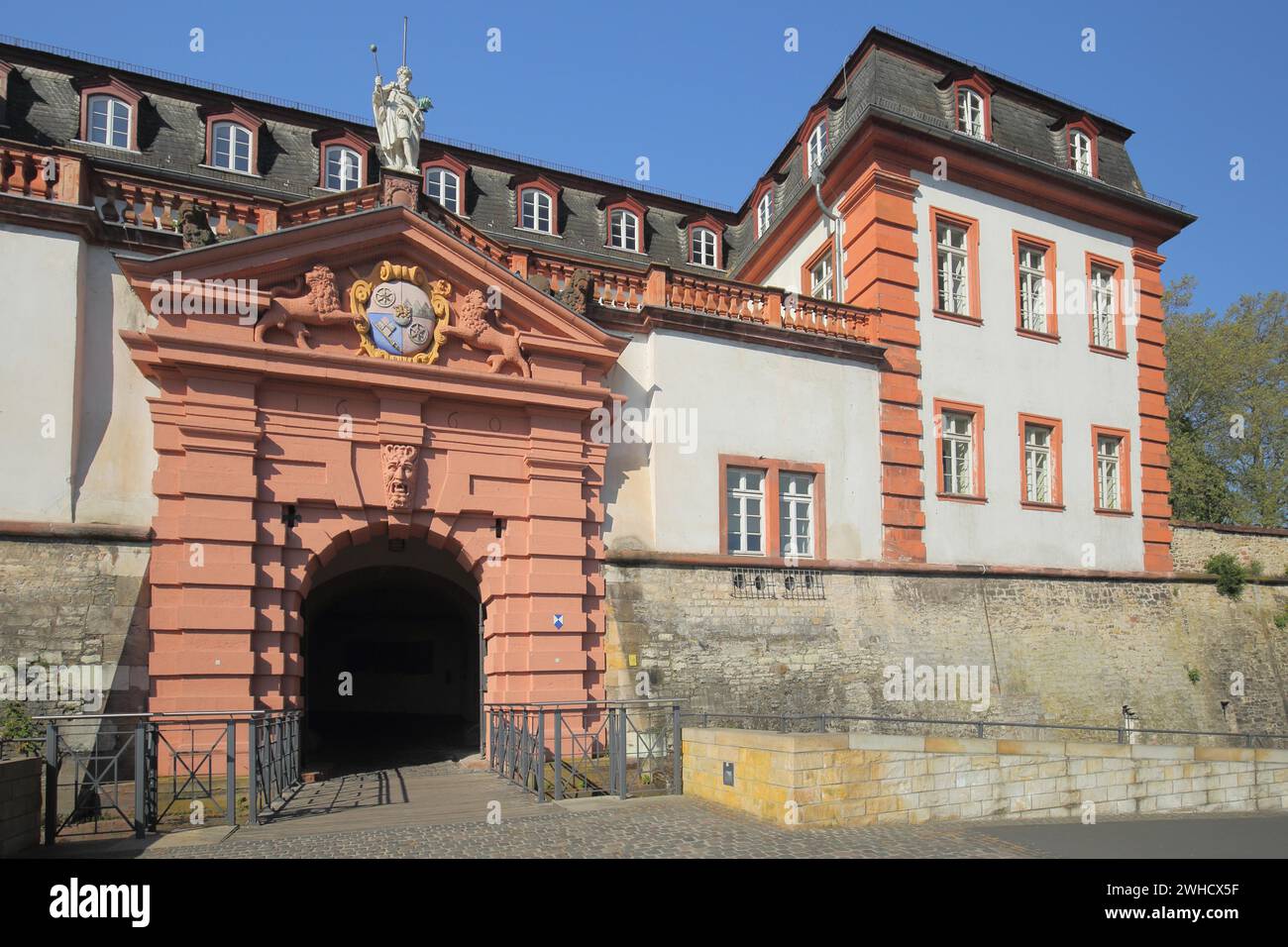 Baroque commandant's building and main gate with ornaments, figure of ...