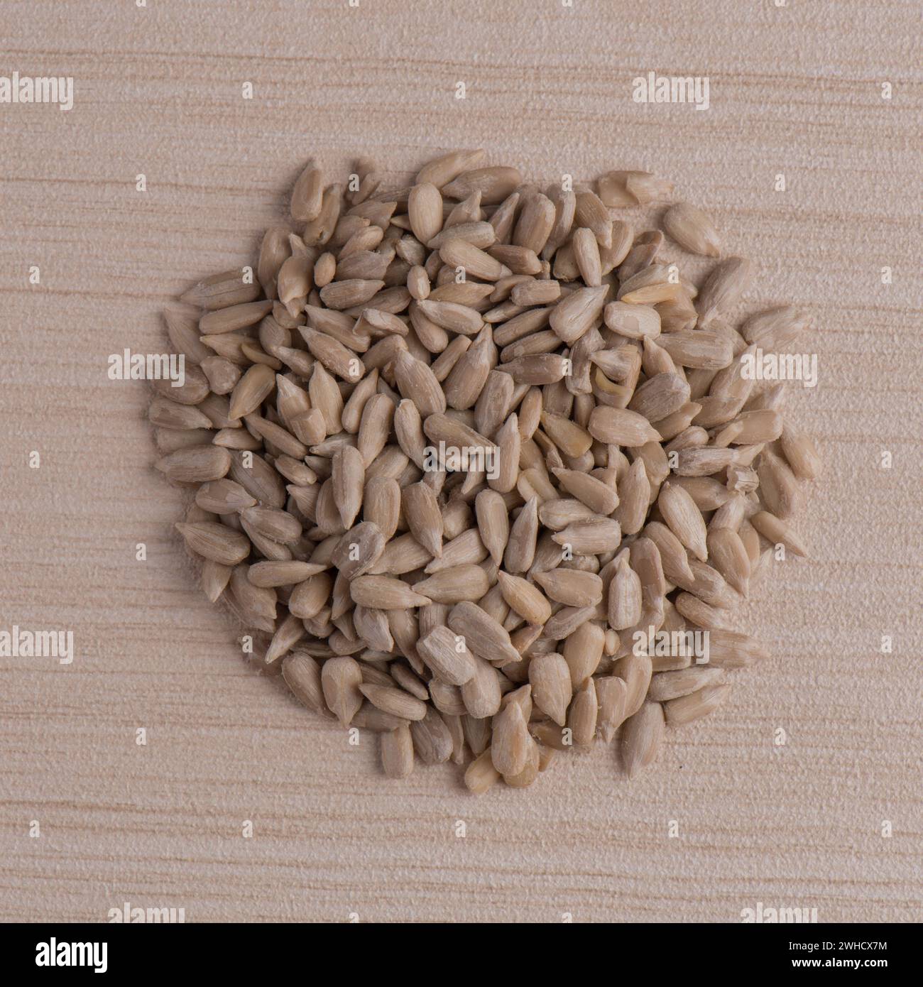 Circle of shelled sunflower seeds Stock Photo - Alamy