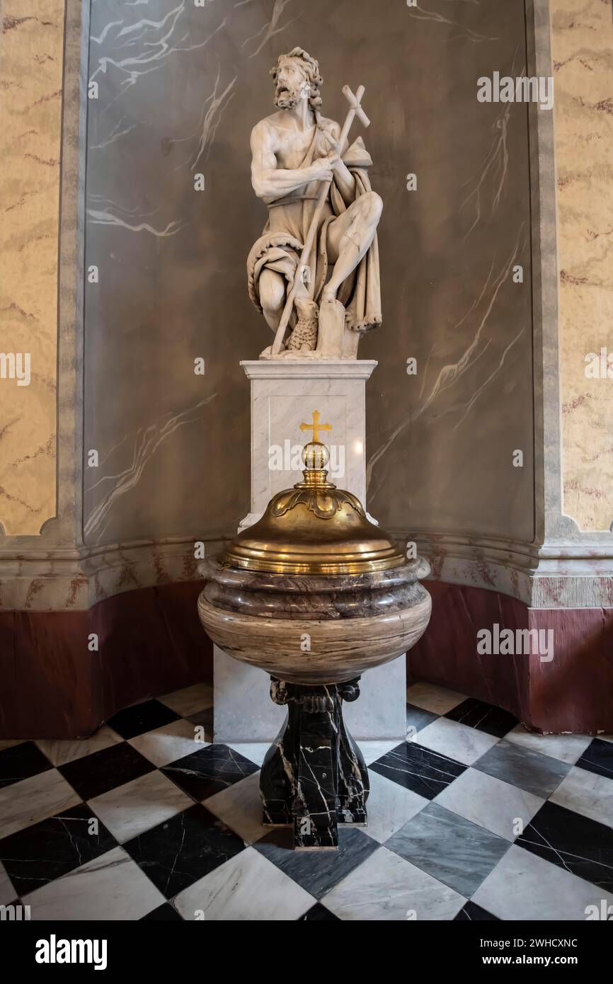 Interior view of St Trinitatis Cathedral, golden baptismal font ...