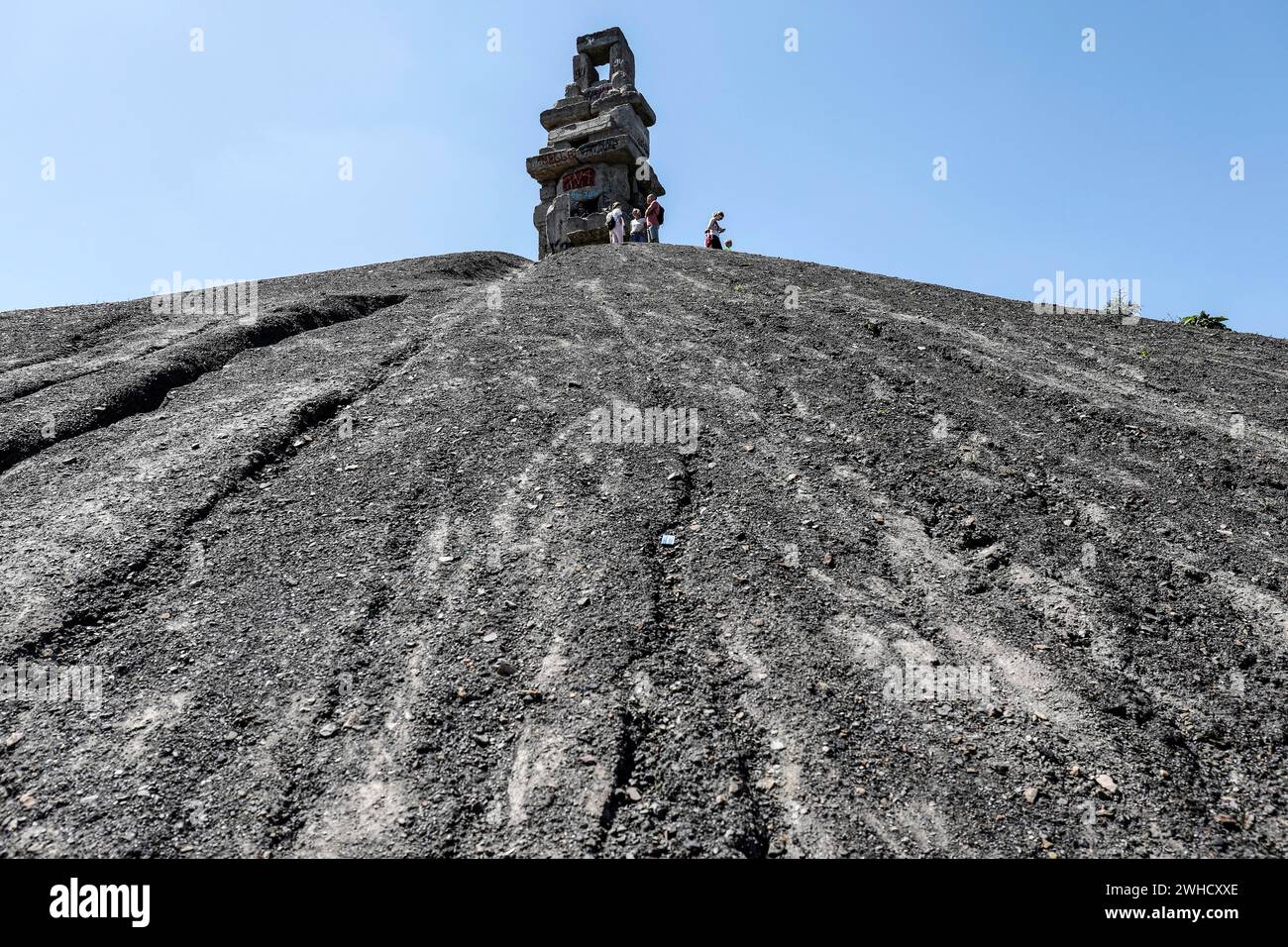E-bikers cycle to the Rheinelbe spoil tip in Gelsenkirchen. The ...