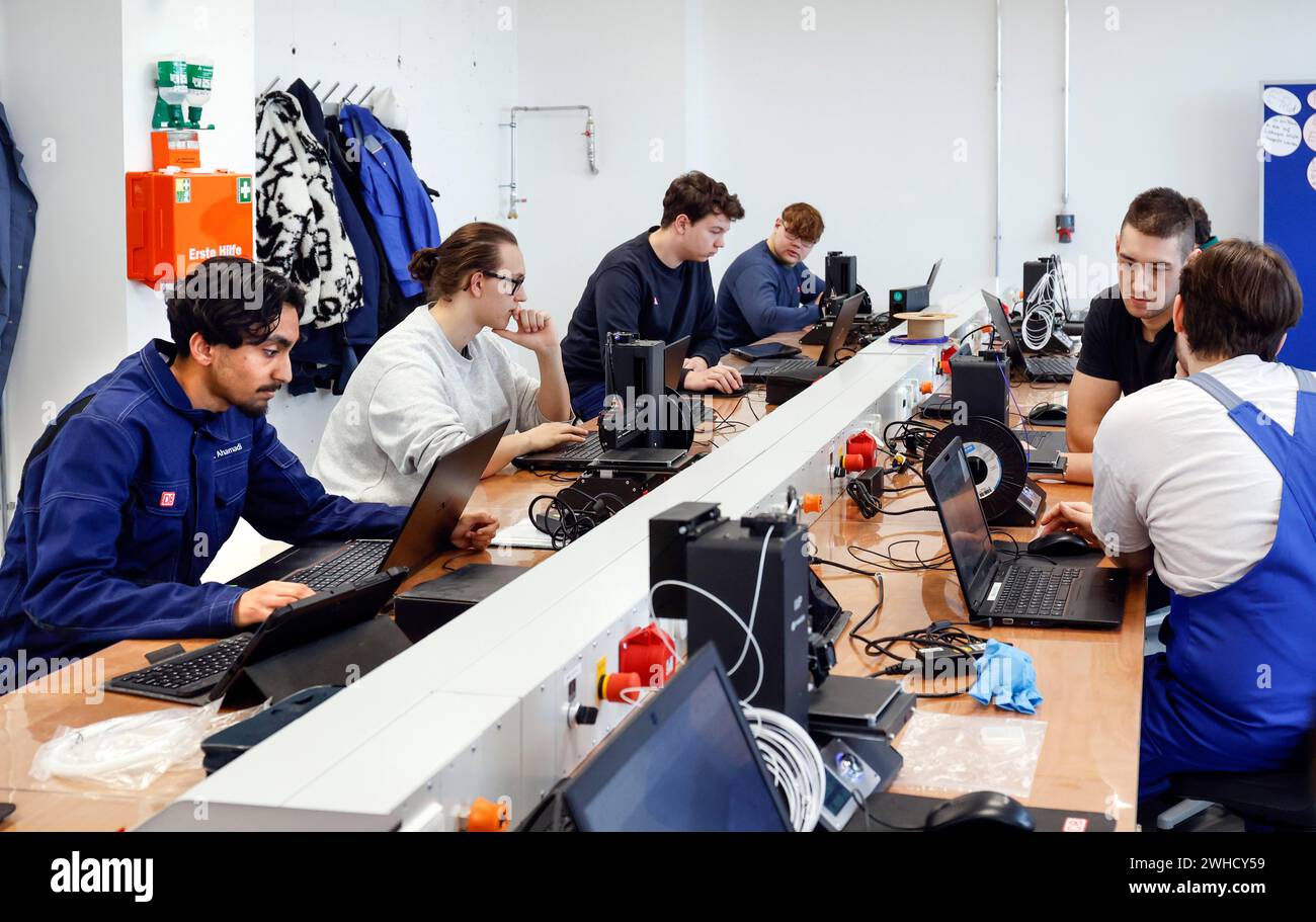 Trainees at a Deutsche Bahn training centre for industrial and ...