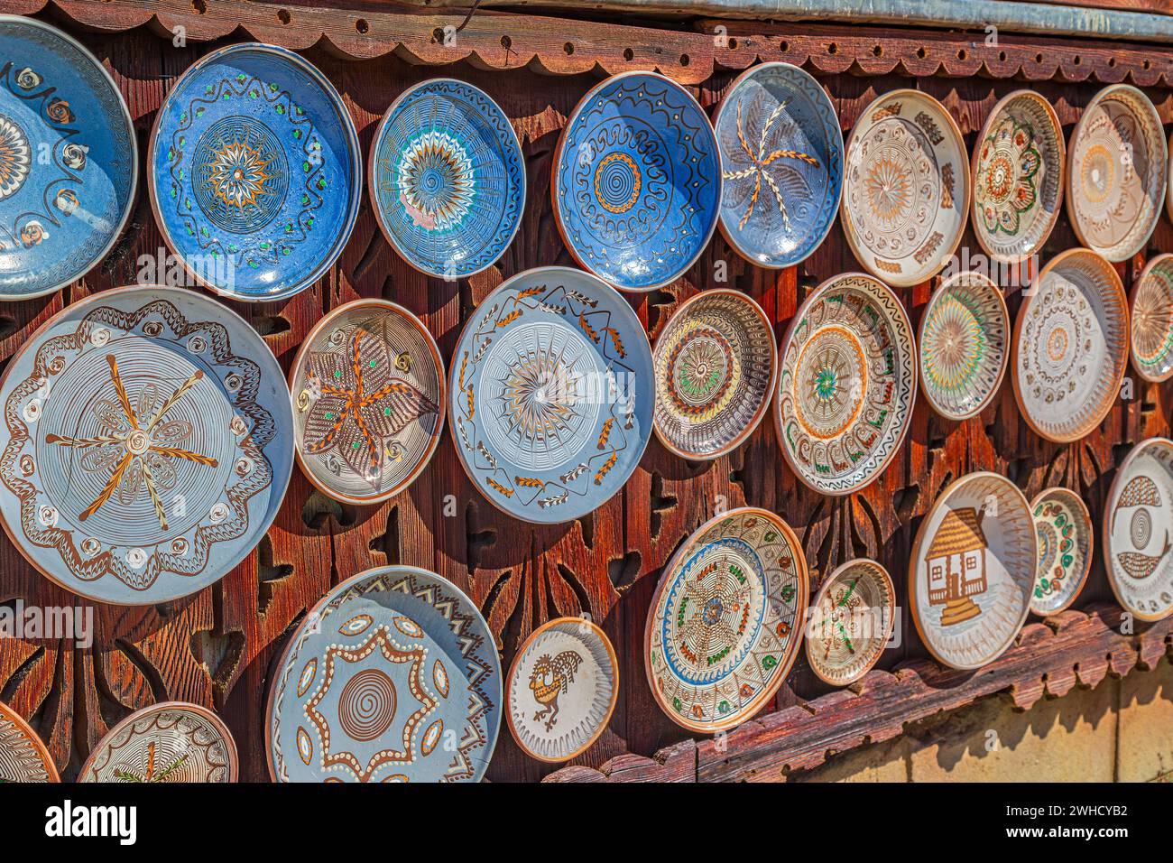 Romanian traditional ceramic plates from Horezu area, Romania, placed ...