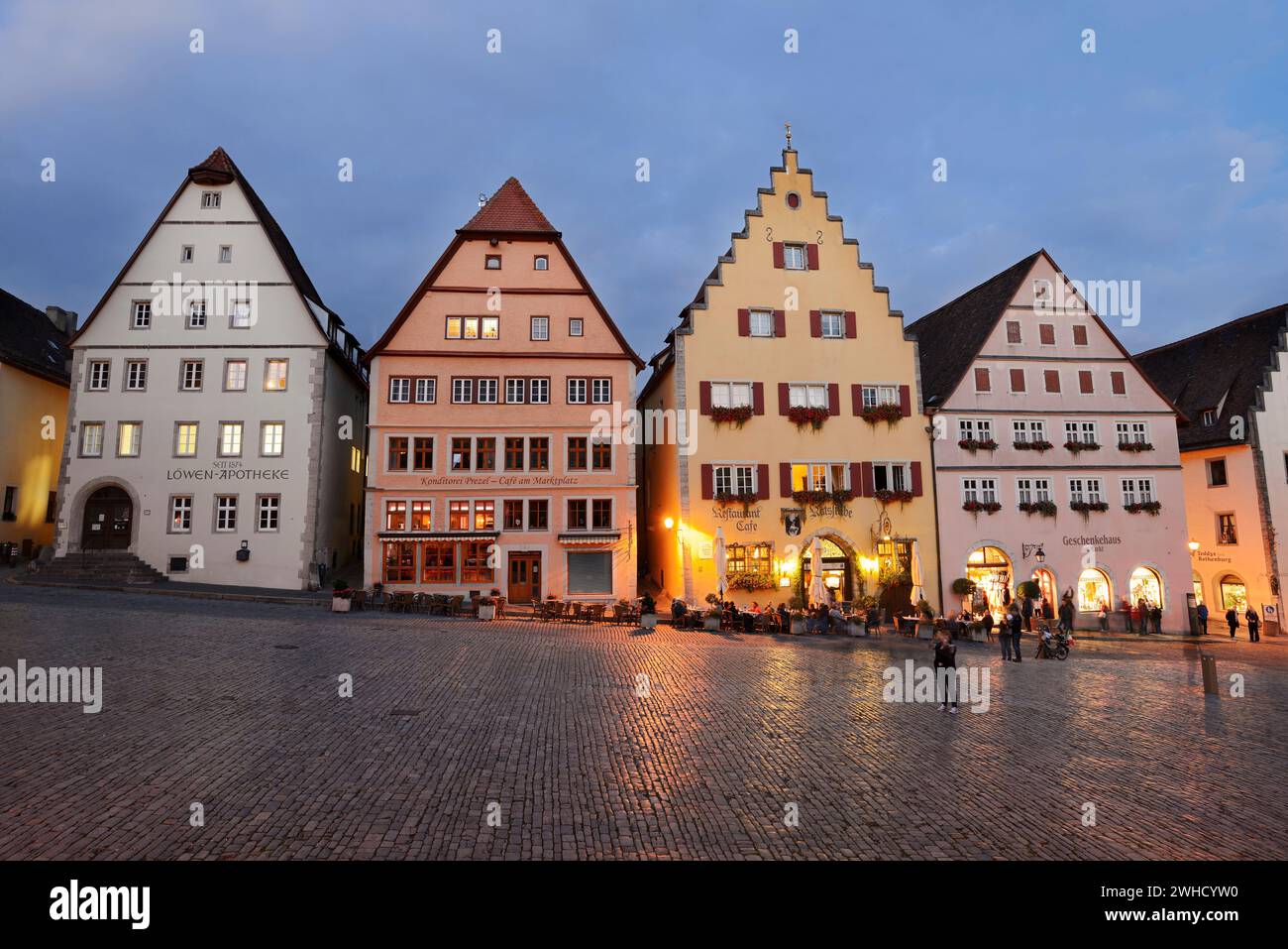 Restaurant and stores on the market square in the evening, Rothenburg ...