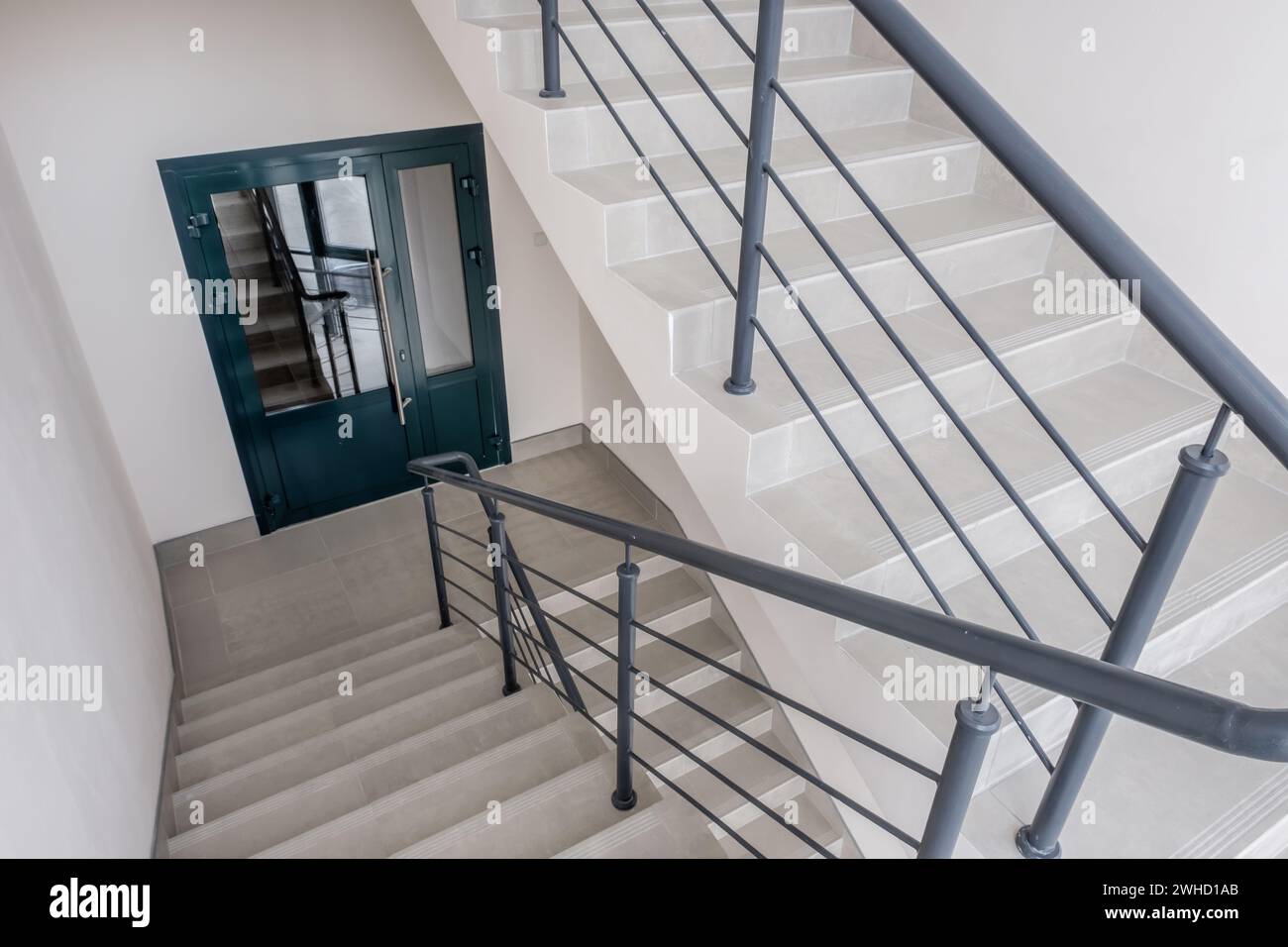 stairs emergency and evacuation exit stair in up ladder in a new office ...