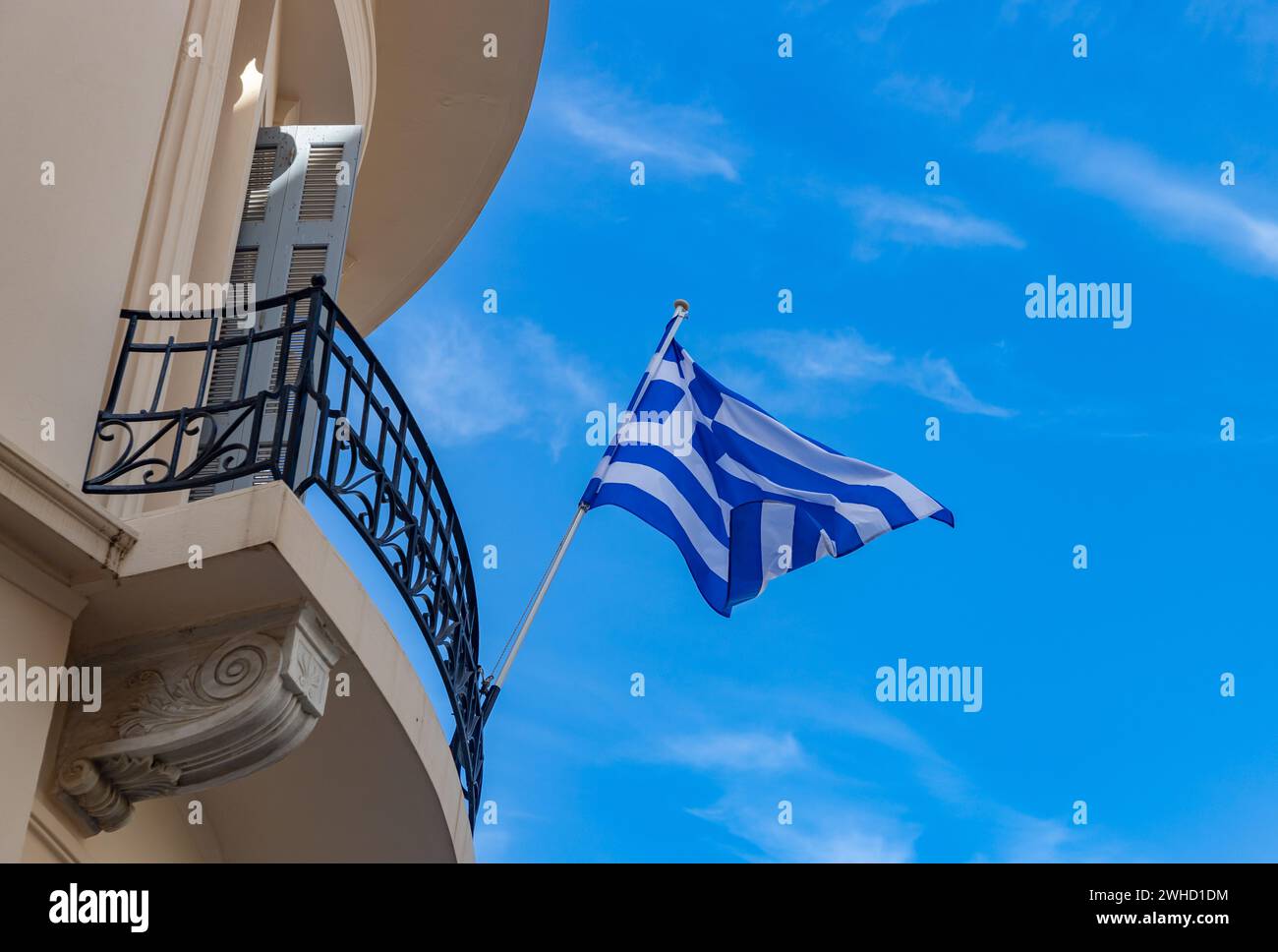 A picture of the Greek flag hanging from an apartment balcony Stock ...