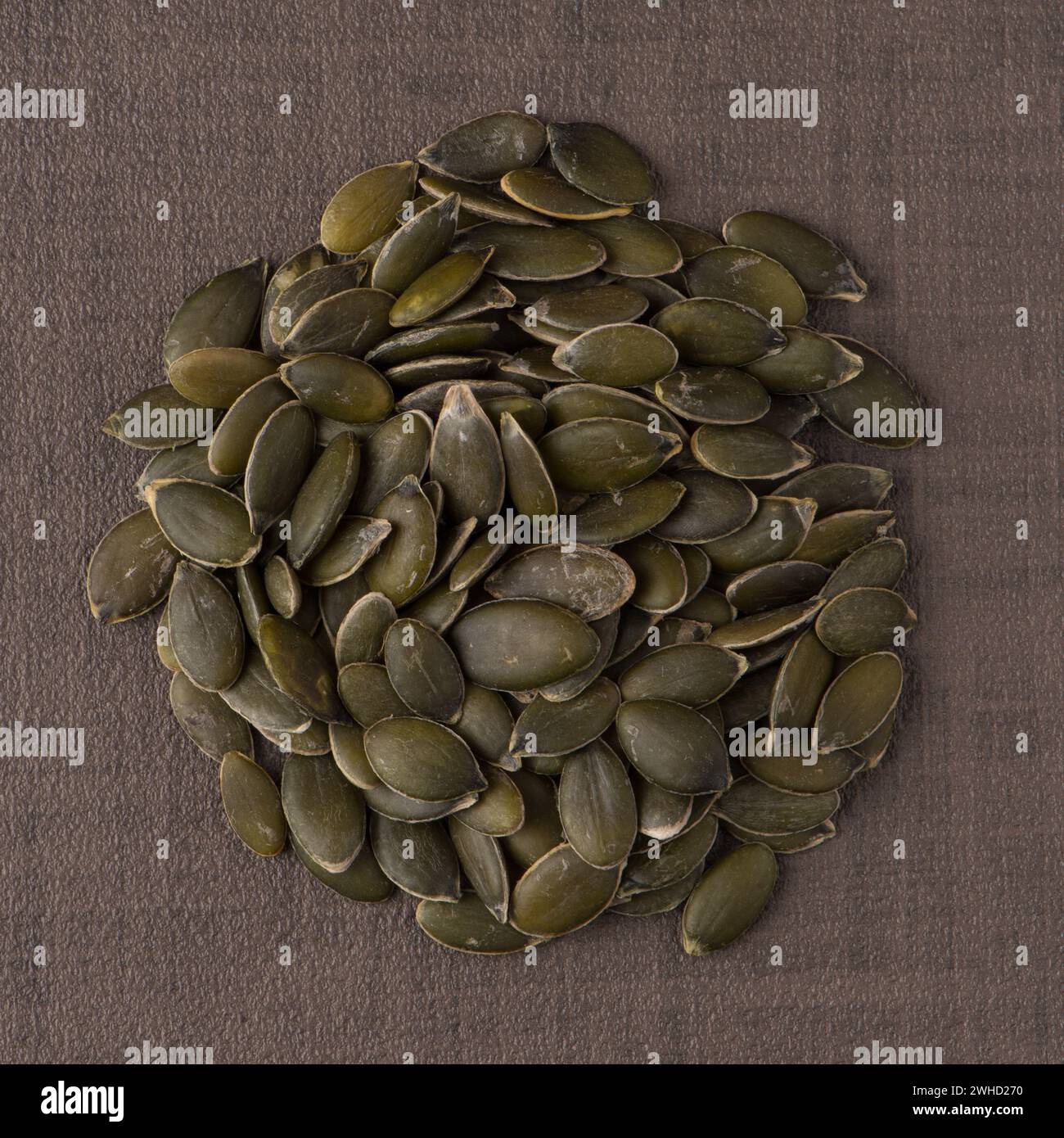 Circle of pumpkin seeds Stock Photo - Alamy