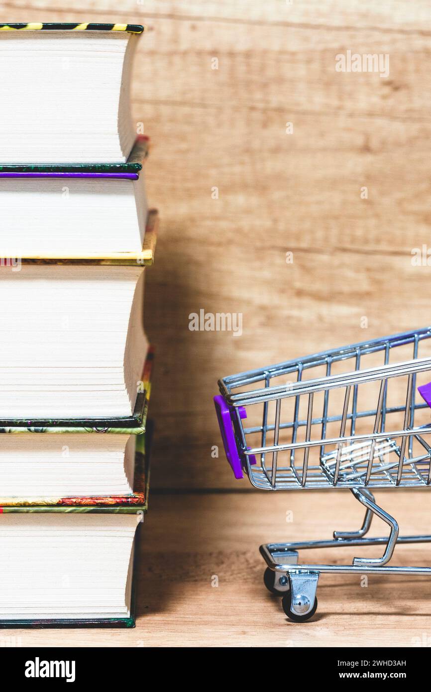 stack of books .Trolley. Concept of book trade, book business ...
