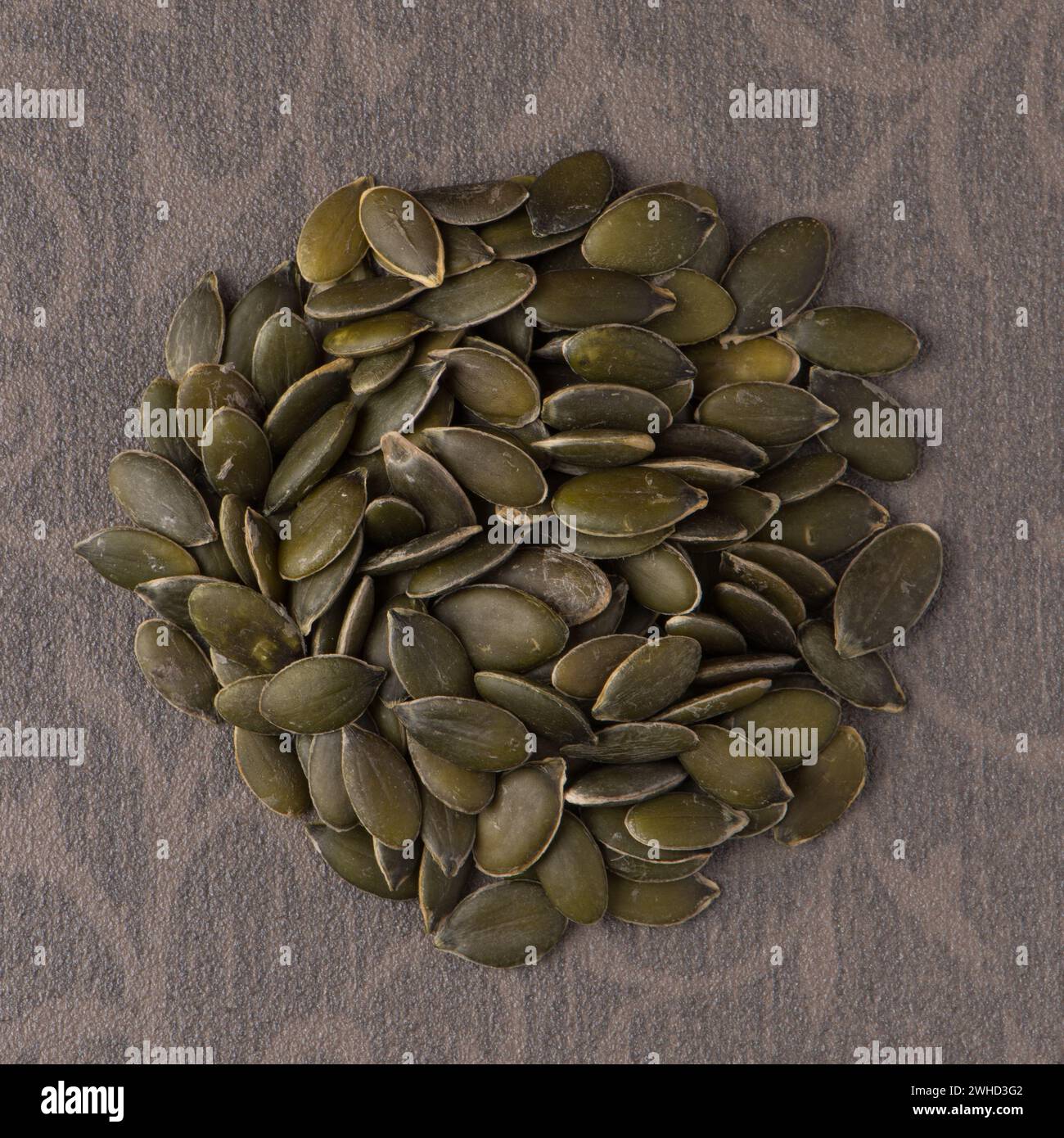Circle of pumpkin seeds Stock Photo - Alamy