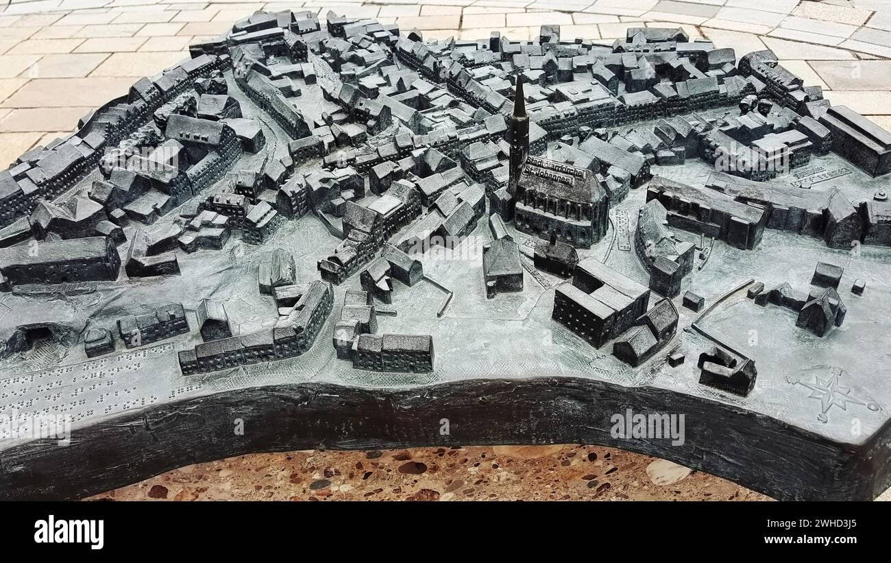 The historic city centre of Dingolfing with a view of the bronze city ...