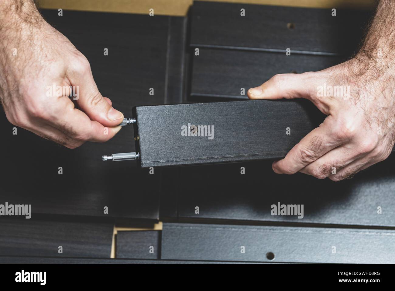 Hand and fittings. Inserting wood joints. Installation of wooden ...