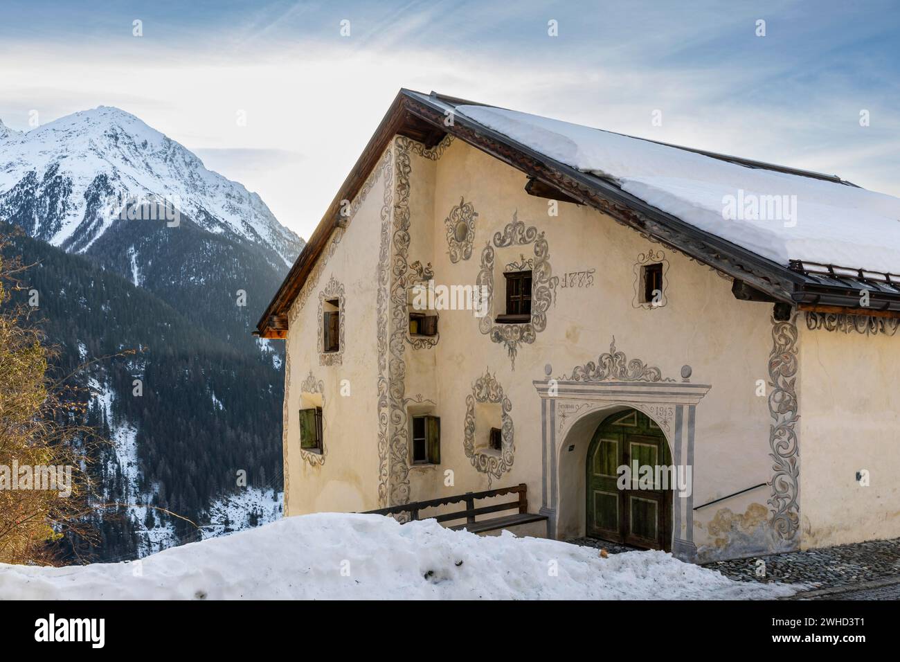 Historic house, sgraffito, facade decorations, mountain peak, snow ...