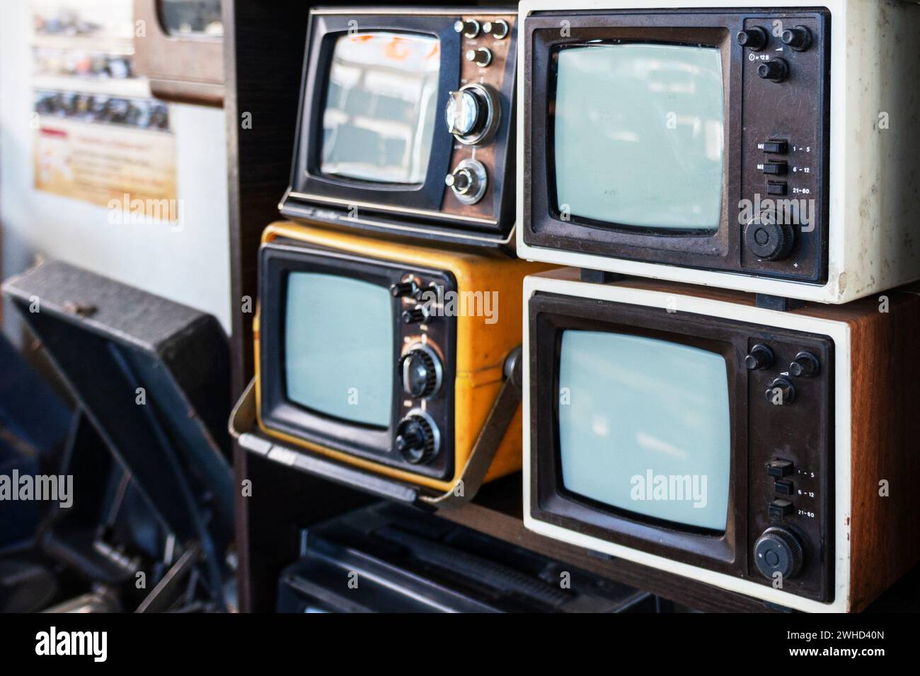 Many retro television. vintage old TV is colorful multi-row. Seeing the ...