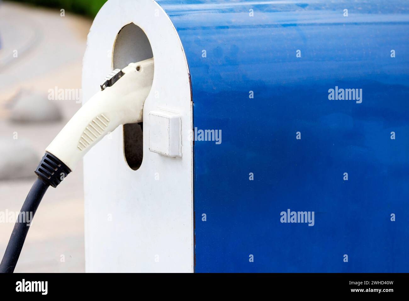 Electric Car Charging Column. Electric vehicle charging station for ...