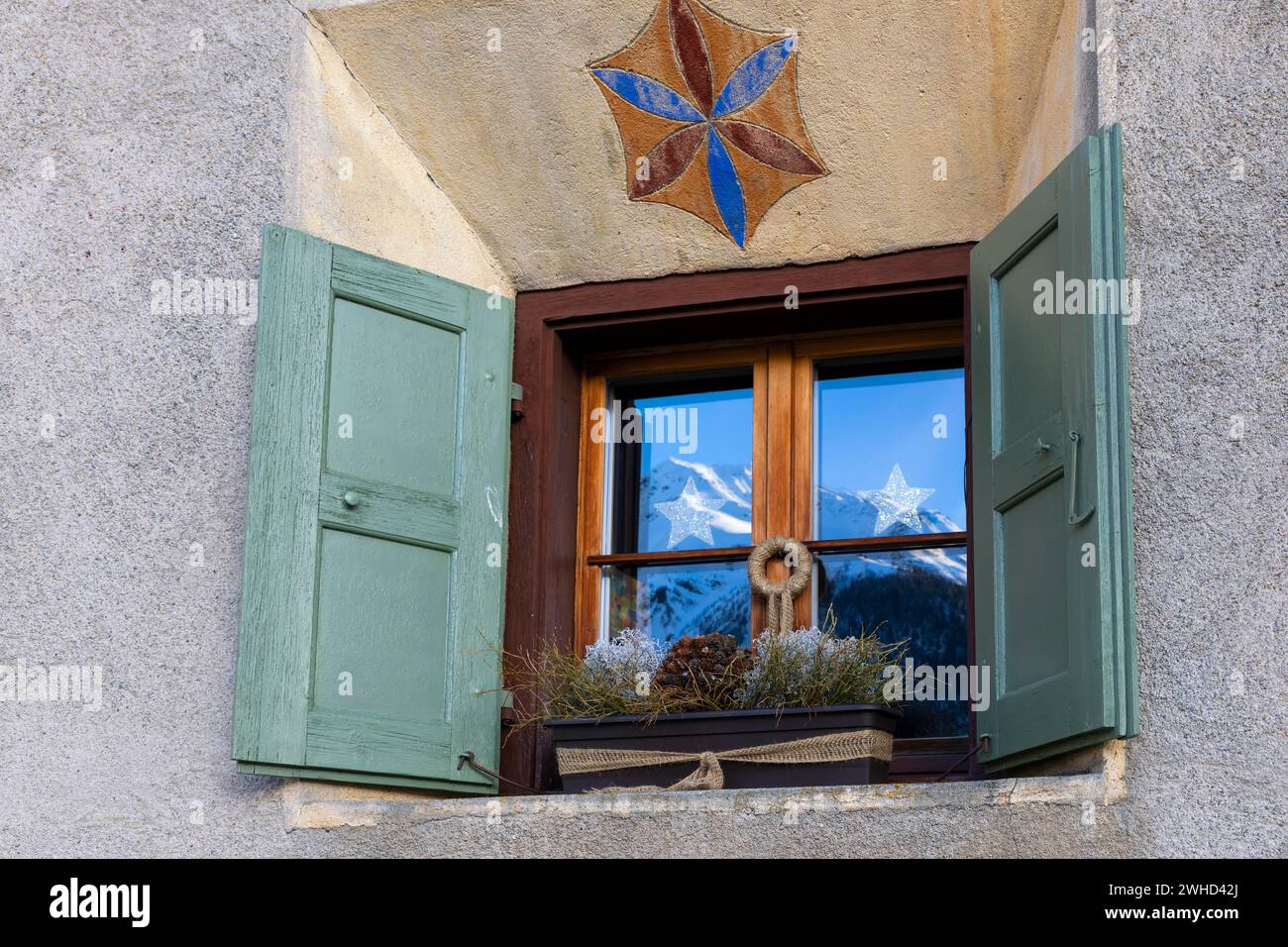 Windows on historic house, sgraffito, facade decorations, shutters ...