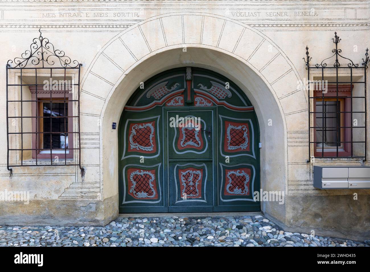 Large painted wooden door, window, historic house, sgraffito, facade ...