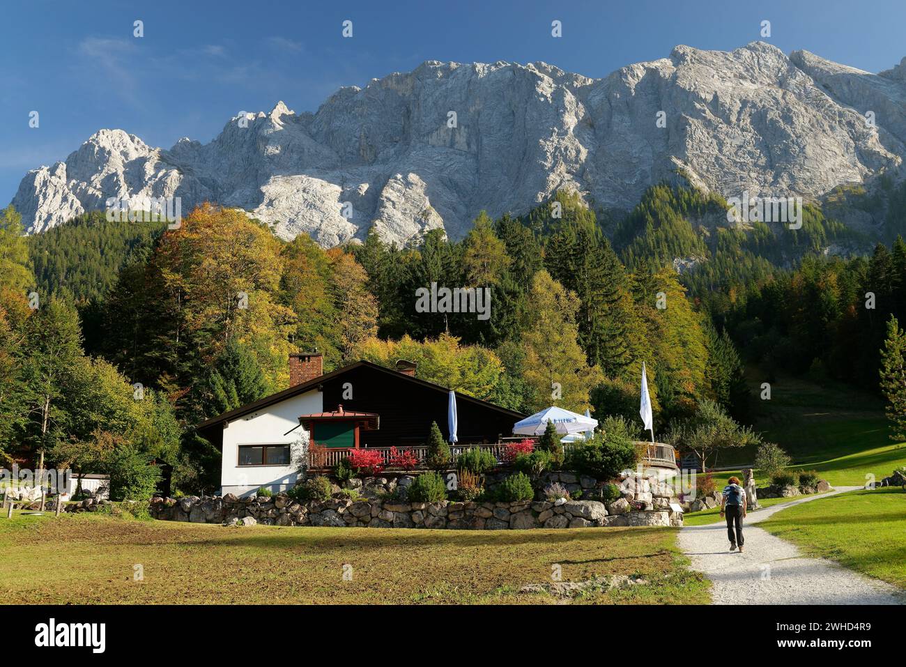 Footpath to the Eibsee Alm with a view of the autumnal Zugspitze group ...