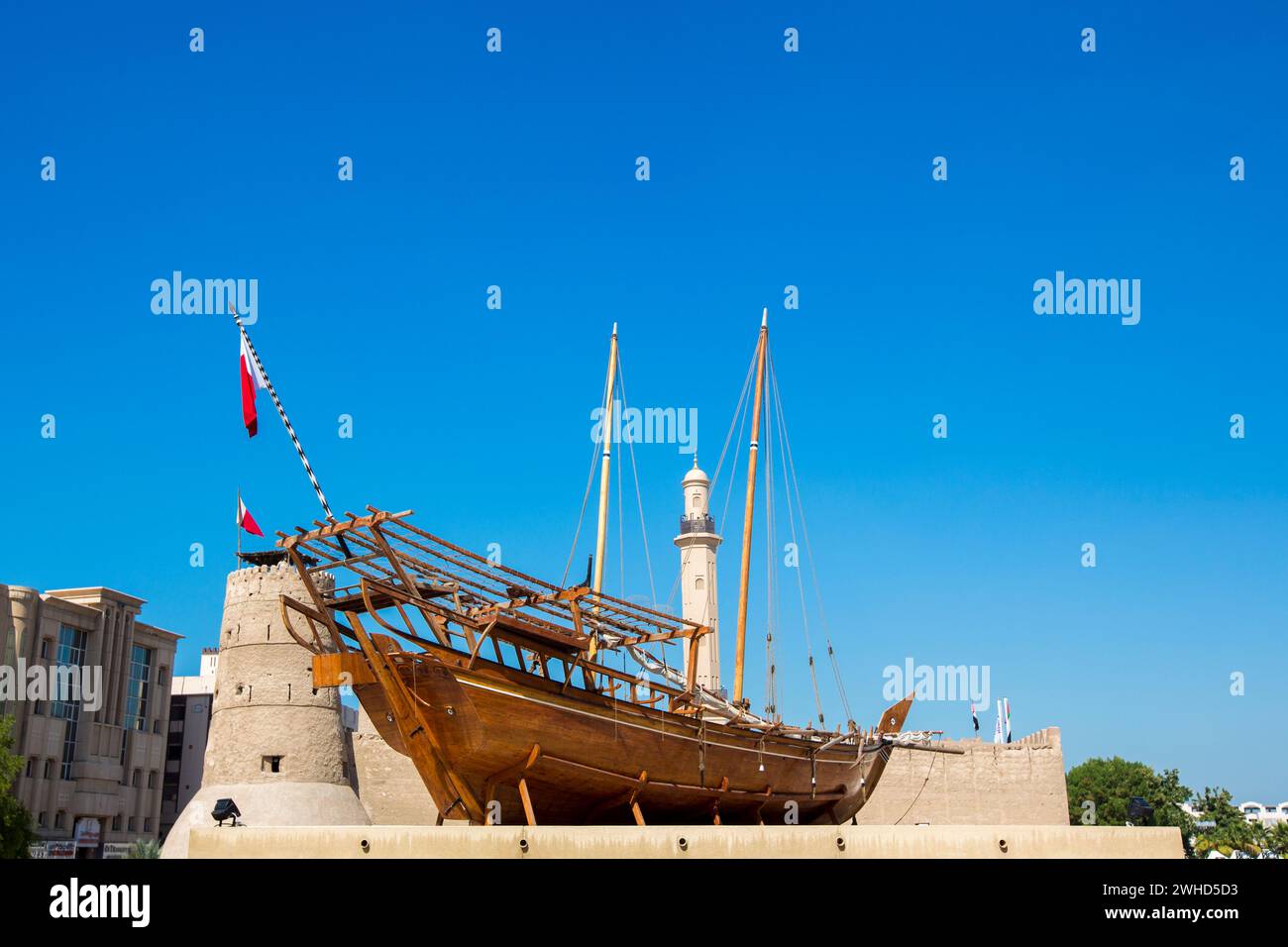 Small traditional wooden rowing boats - abras , with Al Fahidi Old Fort ...