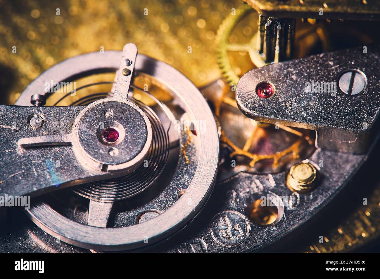Macro view of gears in an old wall clock mechanism Stock Photo - Alamy