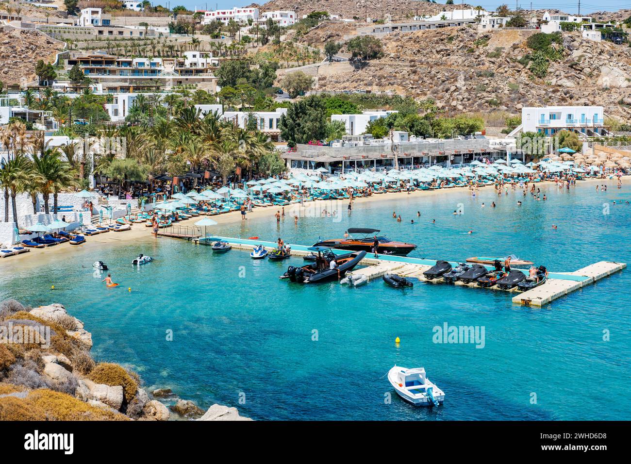 Psarou beach in Mykonos Greece blue sea, umbrella and luxury beach ...