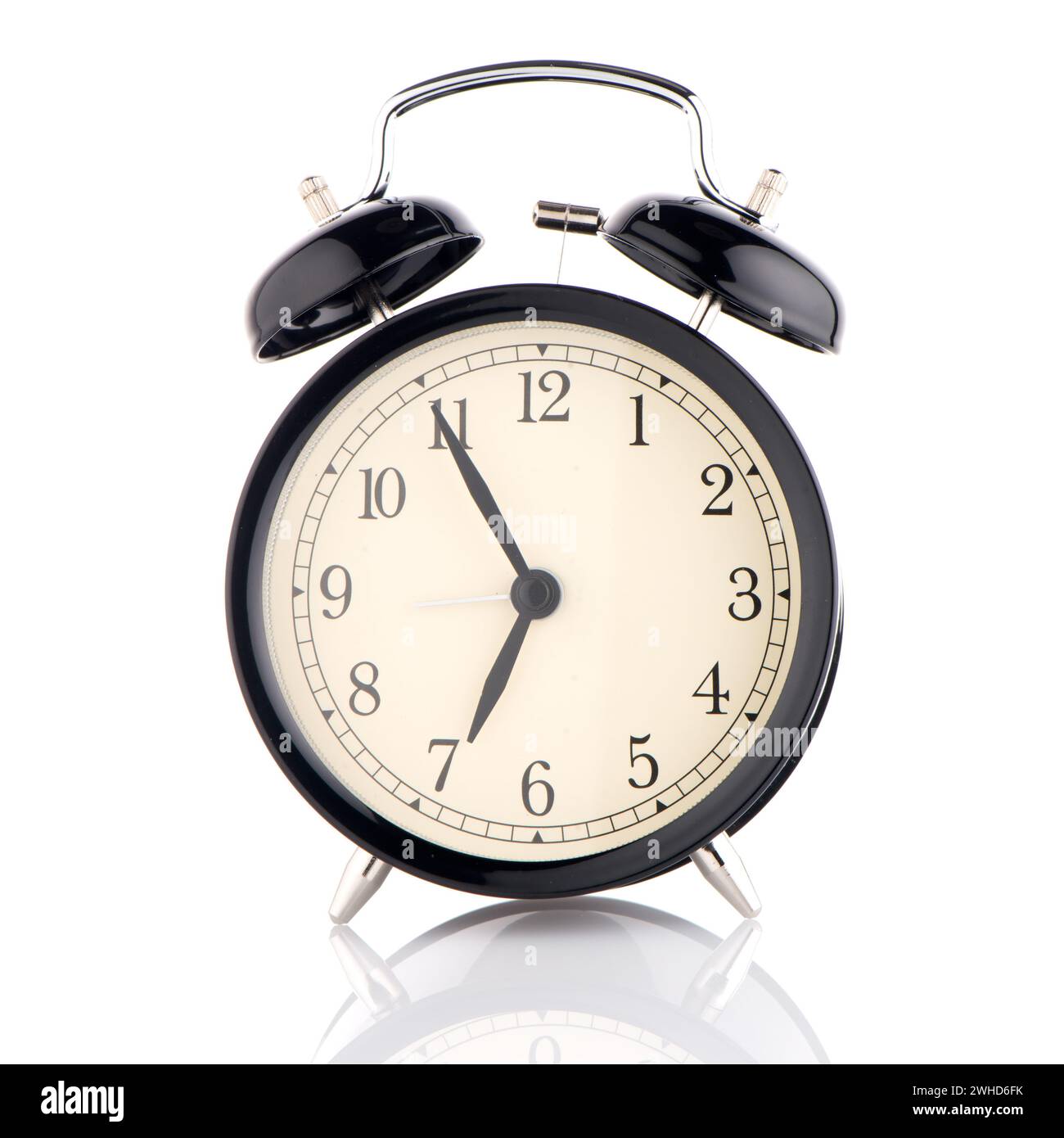 Old fashioned alarm clock Stock Photo - Alamy