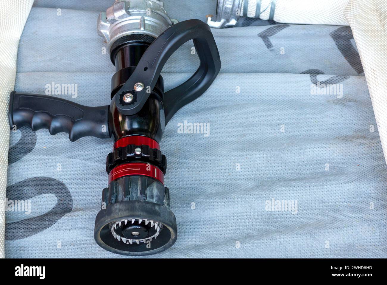 Fire hose. tools for fire extinguishing. close-up hose to extinguish ...