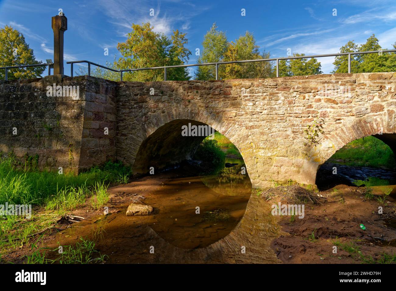 Historic arch bridge over the Thulba river in the municipality of ...