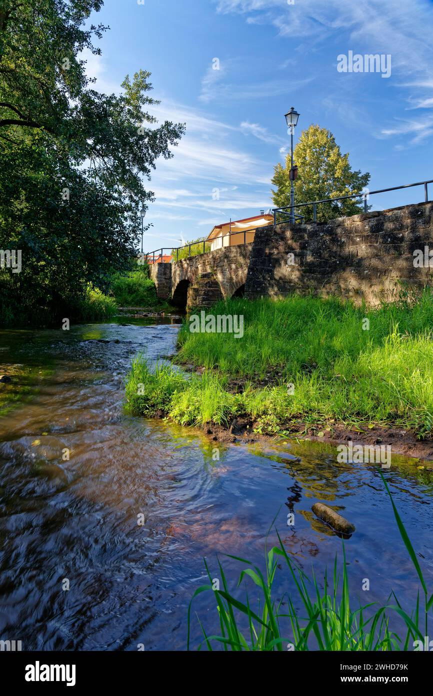 Historic arch bridge over the Thulba river in the municipality of ...