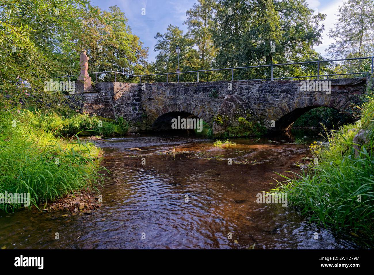 Historic arch bridge over the Thulba river in the municipality of ...