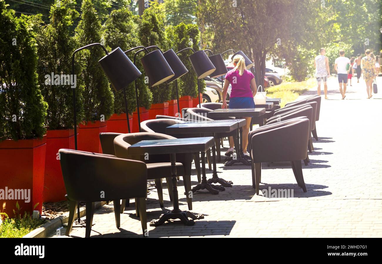 street cafe, tables and stools on the street. restaurant, cafeteria ...