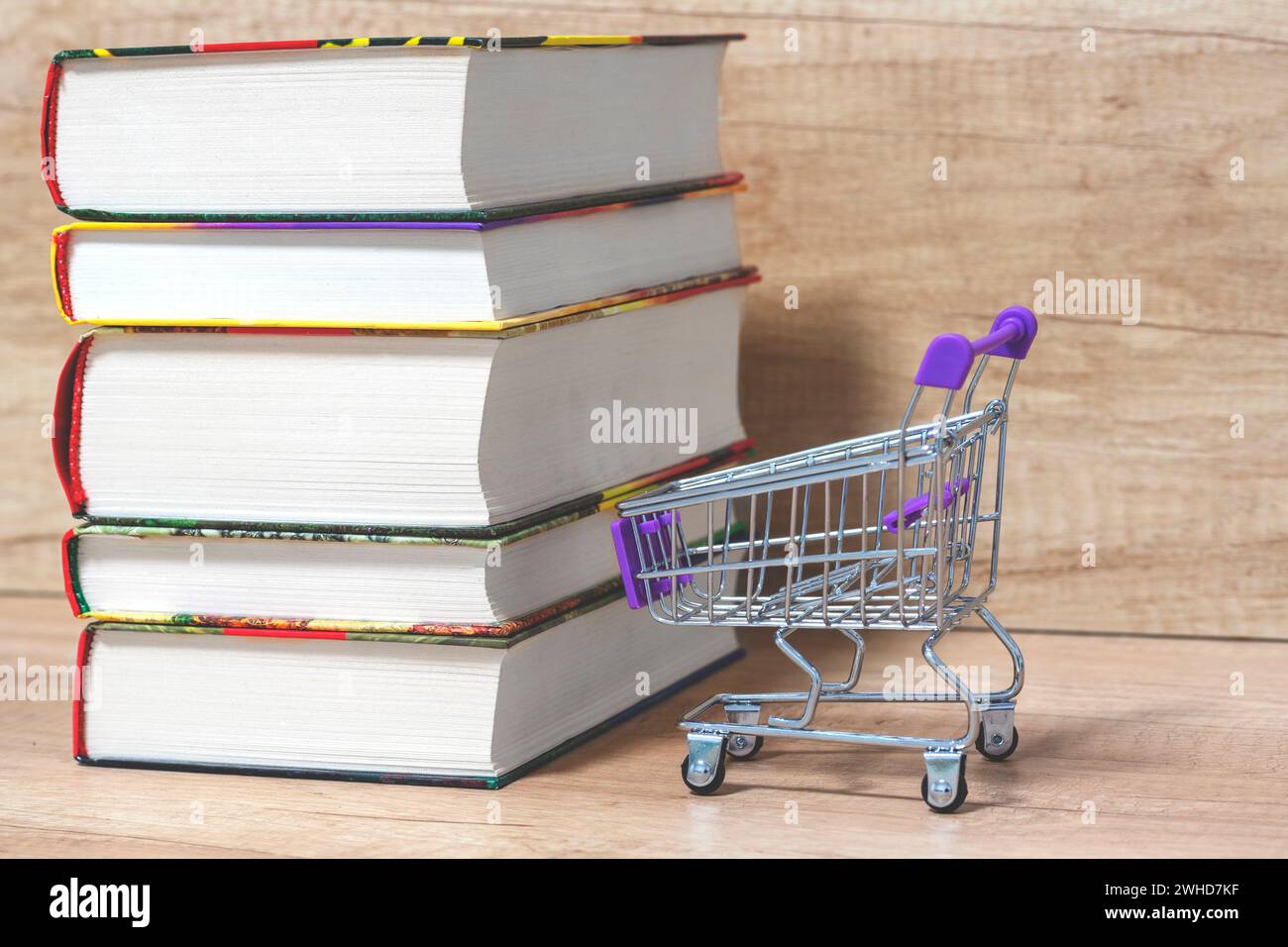 stack of books .Trolley. Concept of book trade, book business ...