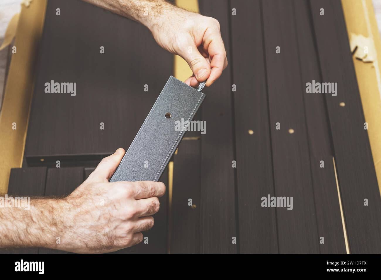 Hand and fittings. Inserting wood joints. Installation of wooden ...