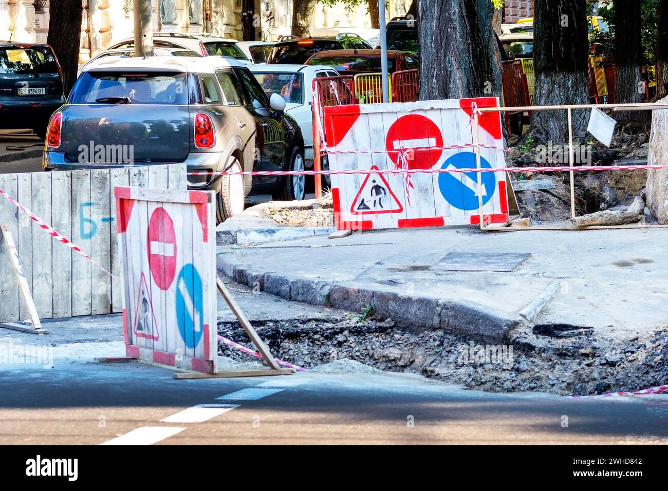 Roadworks, road signs in a highway. Warning of an obstacle in the road ...