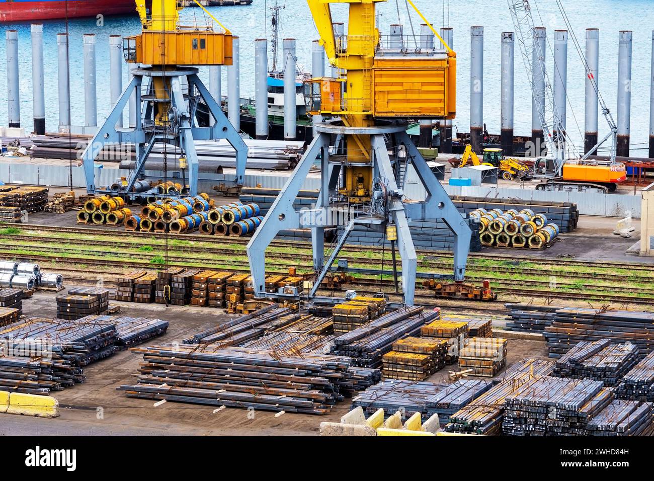 Port Cranes on a Pier of Seaport. Industrial freight.Container terminal ...